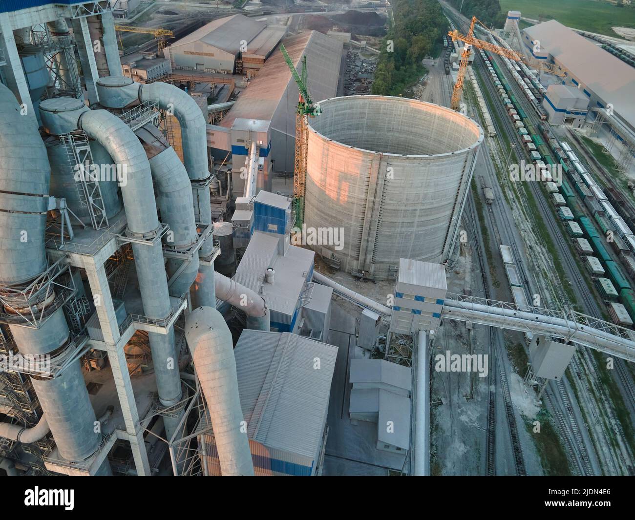 Aerial view of cement factory with high concrete plant structure and ...
