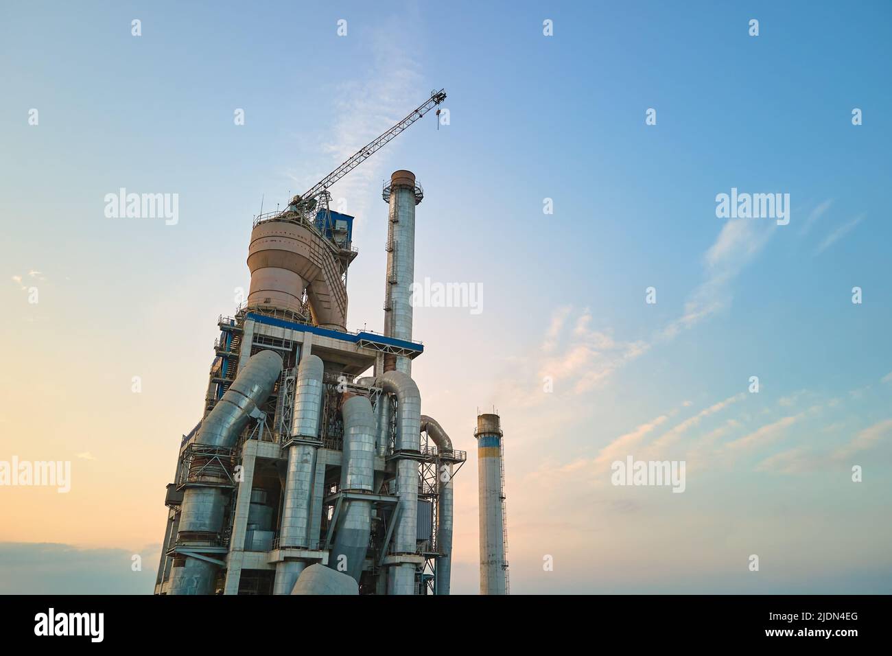 Aerial view of cement factory with high concrete plant structure and ...