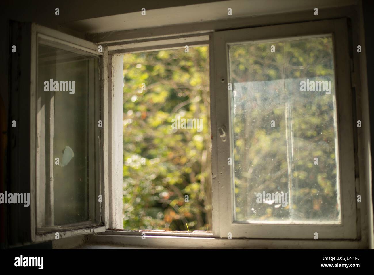 Window in house. Old window frame. Wooden window and glass. Interior in ...