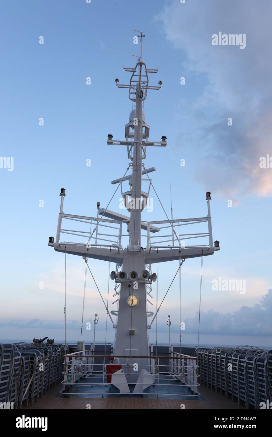 Ship structures, masts, antennas, funnel, ship wheelhouse against the ...