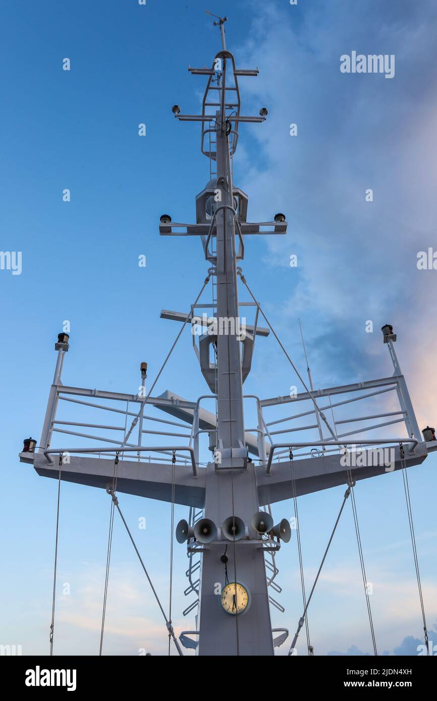 Ship structures, masts, antennas, funnel, ship wheelhouse against the ...
