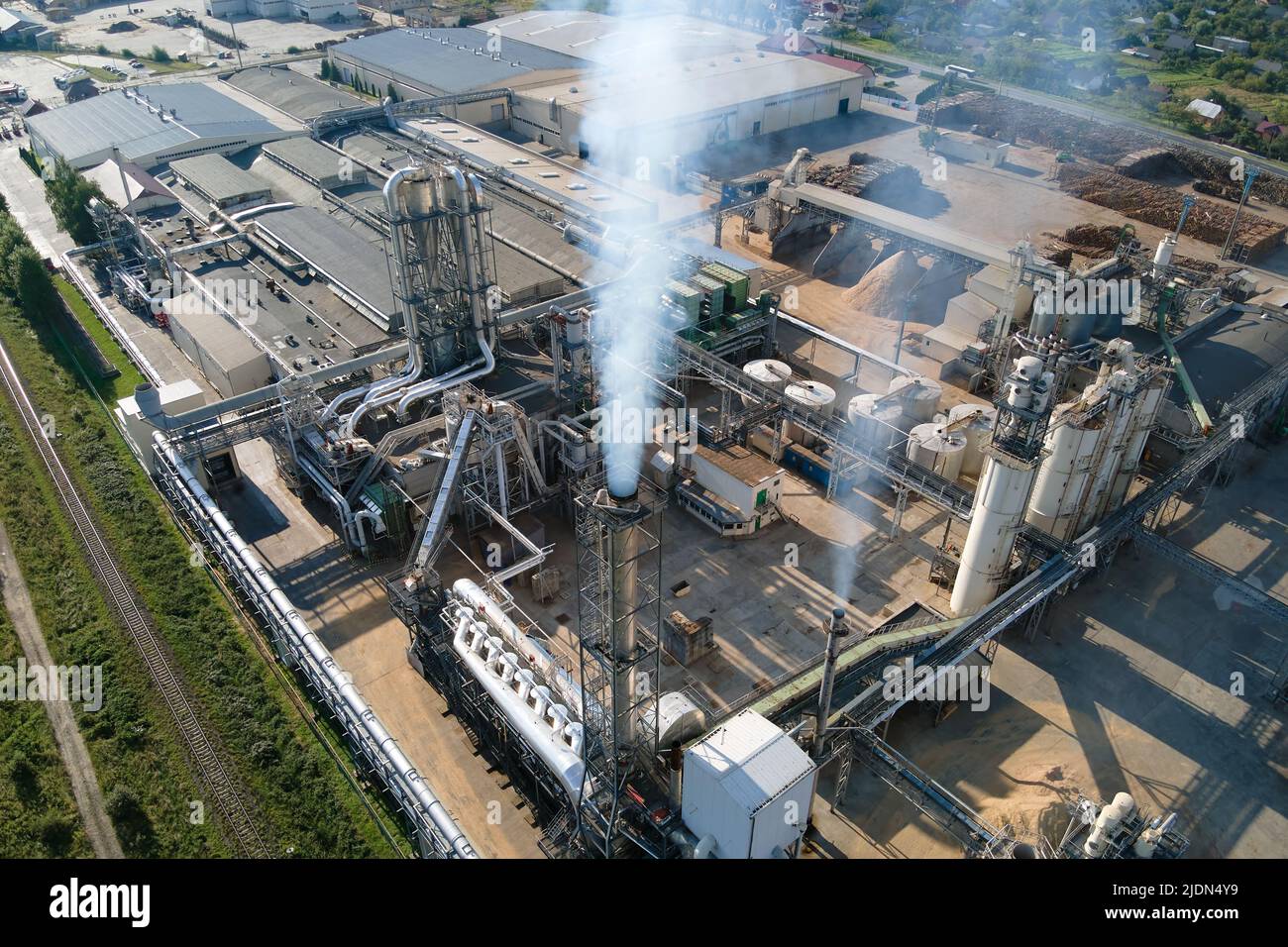 Aerial view of oil and gas refining petrochemical factory with tall ...