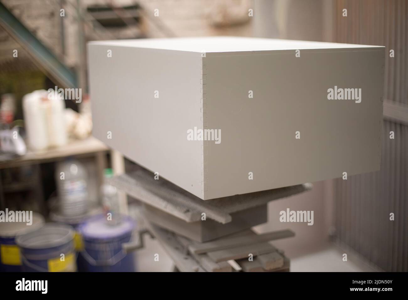 Painting box in gray paint. Painting object in workshop. Wooden box ...