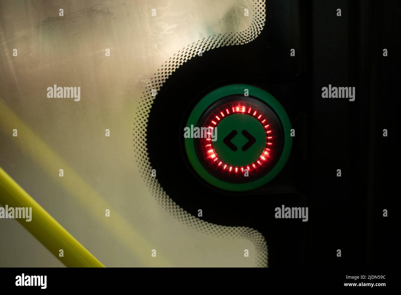 Button on bus. Door opening button. Details in public transport. Door ...