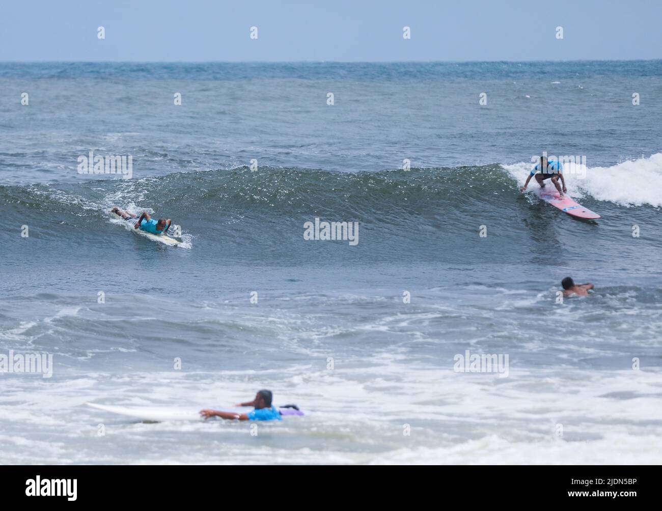 Palestinian Athletes surf on the waves during a surfing championship on ...