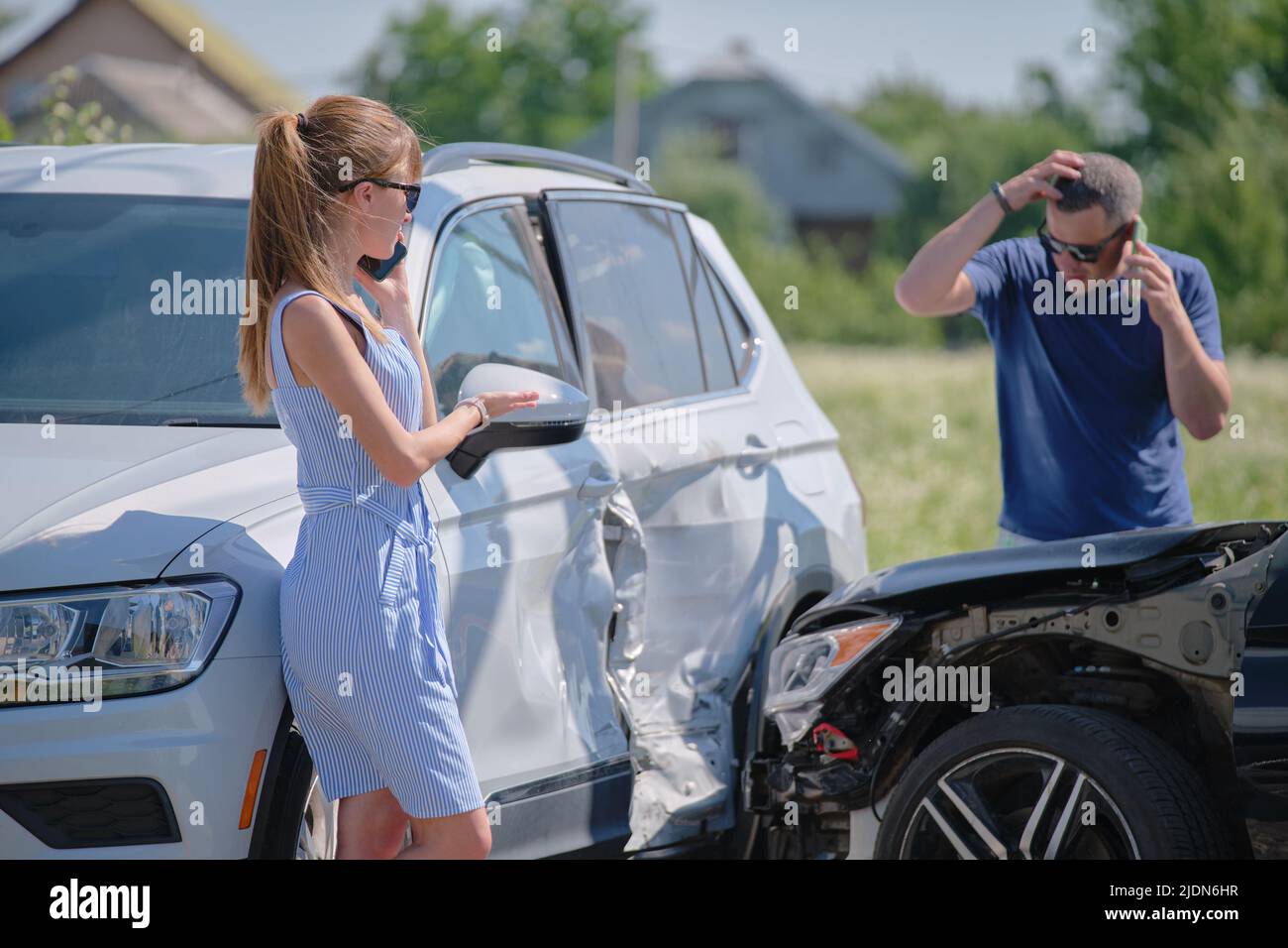 Drivers of smashed vehicles talking on cellphone calling for help in ...