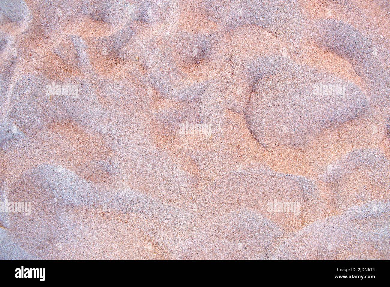 Flat view of clean yellow sand surface covering seaside beach. Sandy ...