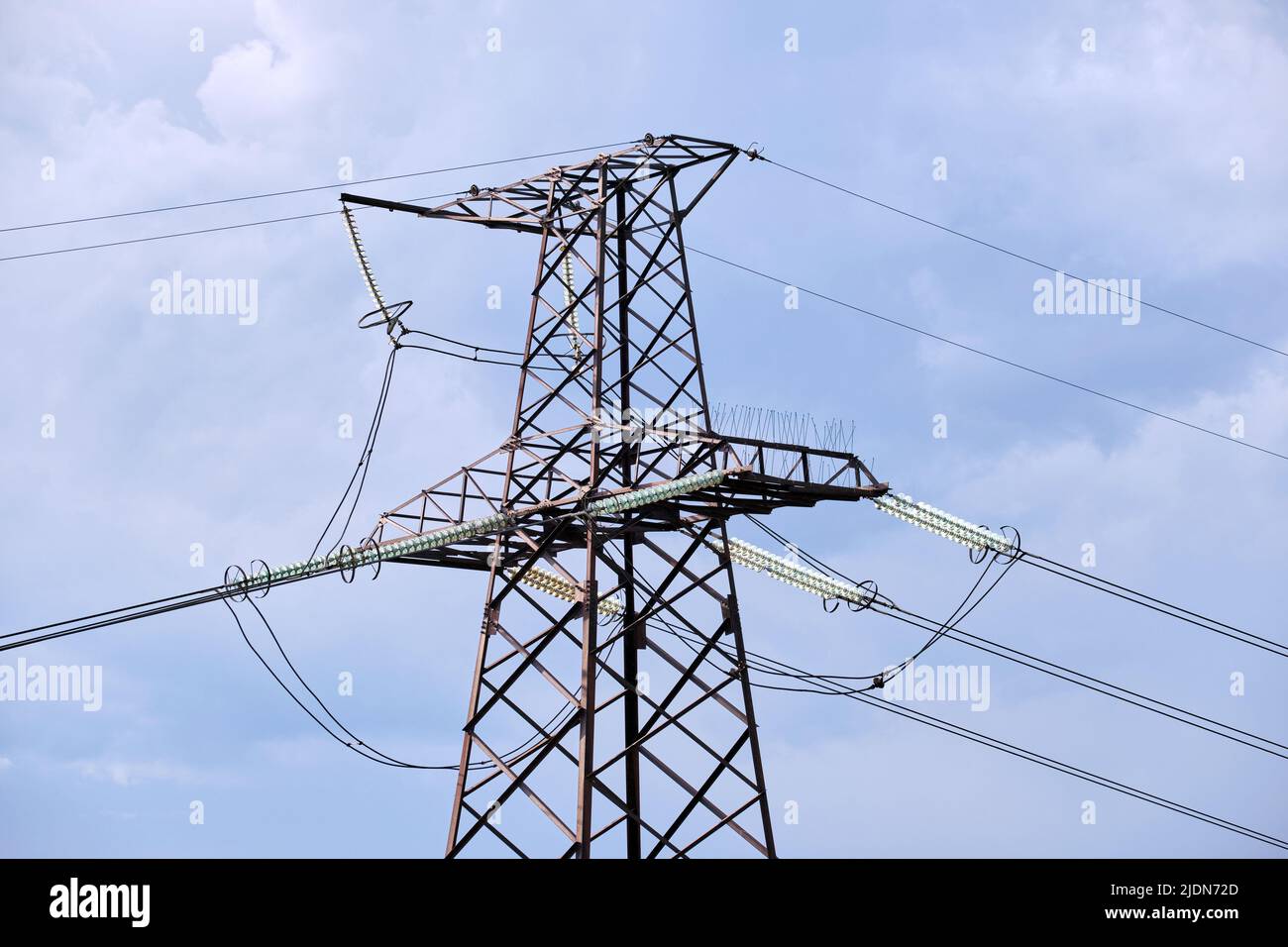 High voltage tower with electric power lines transfening electrical ...