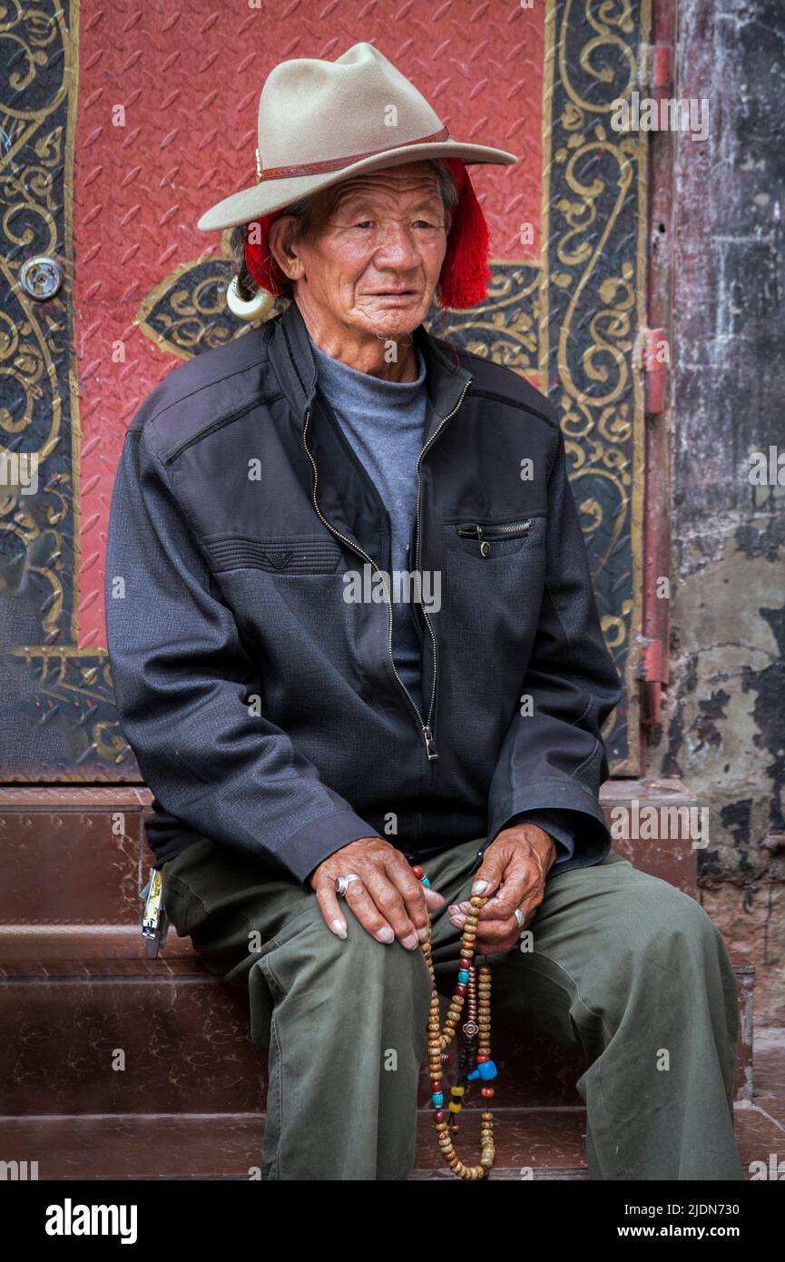 Pilgrim in front of Jokhang temple. The Buddhist Temple in Barkhor ...