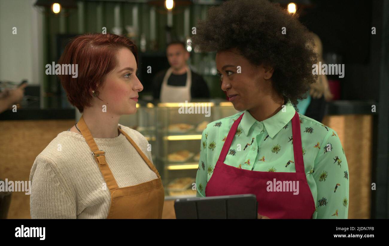 Female manager explaining small business Coffee shop to new employee ...