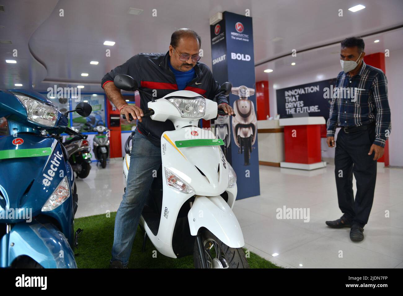 Bangalore, India. 22nd June, 2022. Customer tests an electric two ...