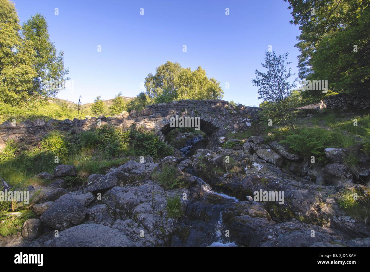Ashness Bridge is a traditional stone packhorse bridge near Keswick in ...
