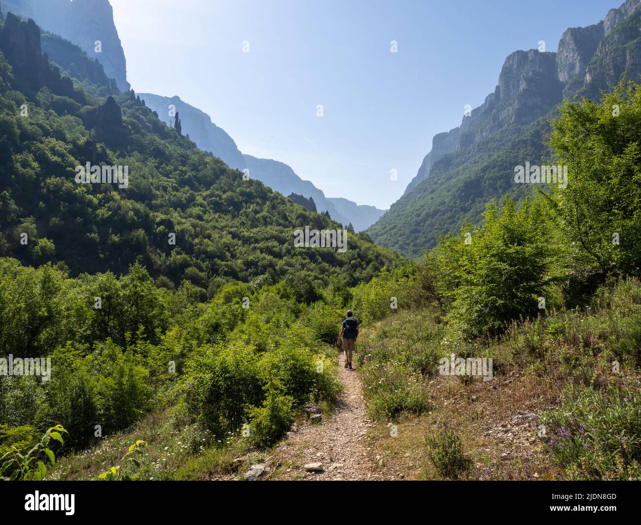 Walking down into the Vikos Gorge from the village of Vikos in the ...