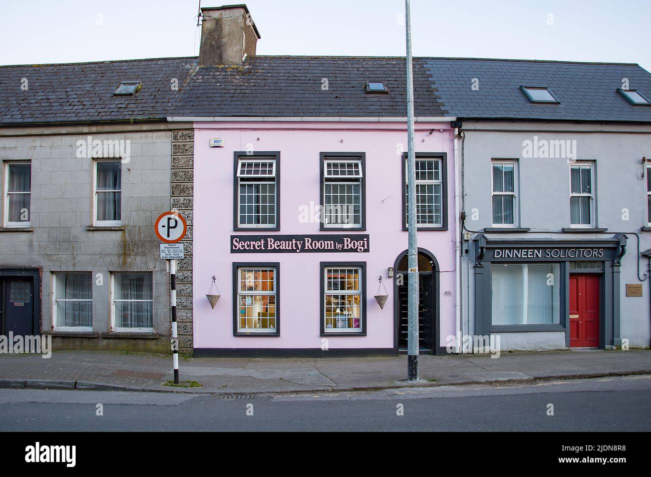 BANDON, COUNTY CORK, IRELAND. MARCH 29, 2022. Facades of small offices ...