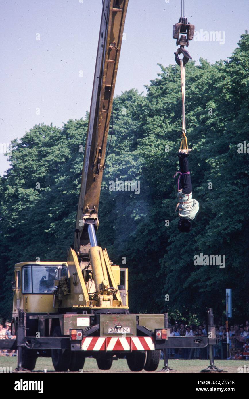 An escapologist at River Nene boat festival, Midsummer Meadow ...