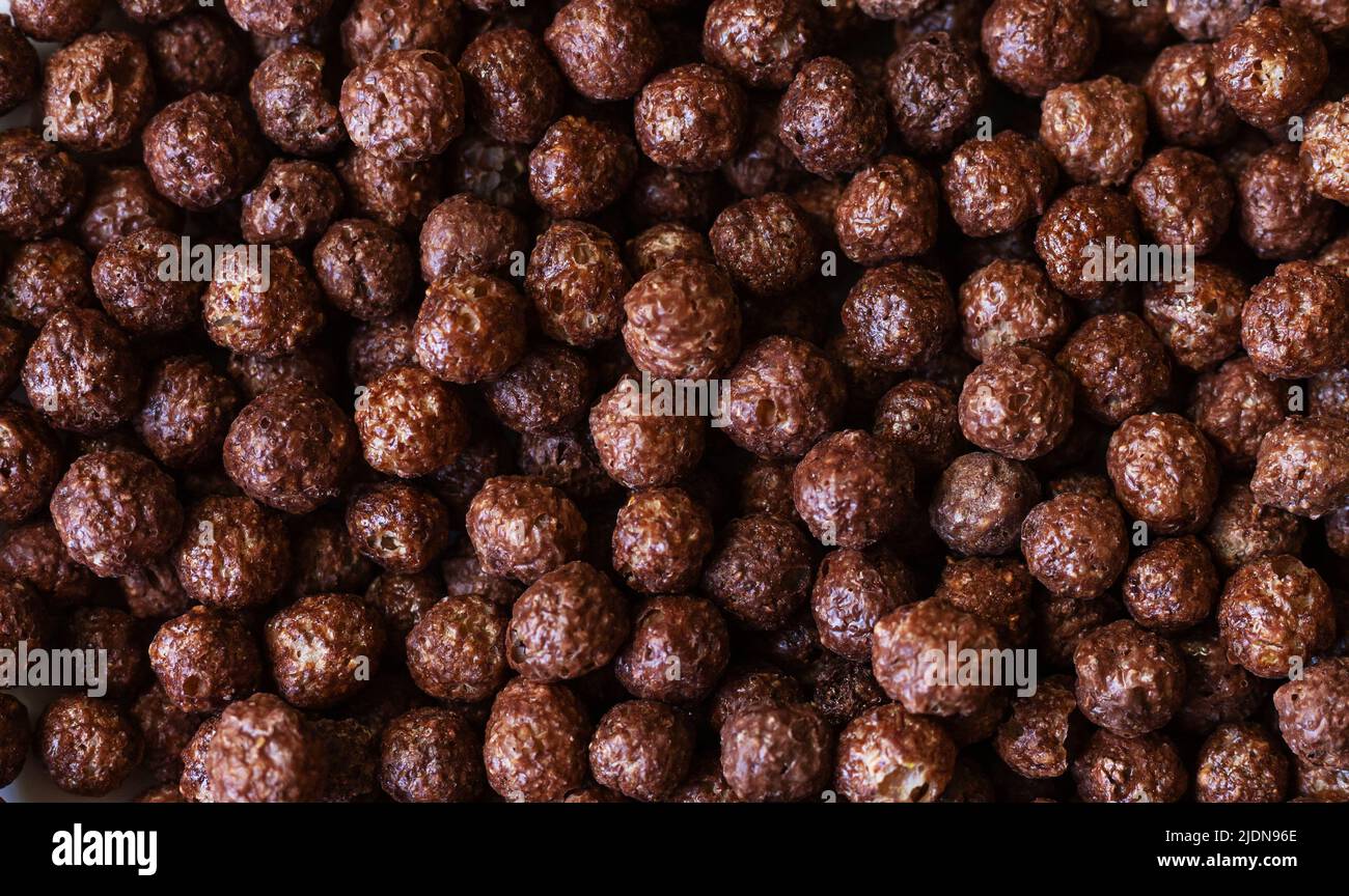 Chocolate corn balls as breakfast background and texture Stock Photo ...