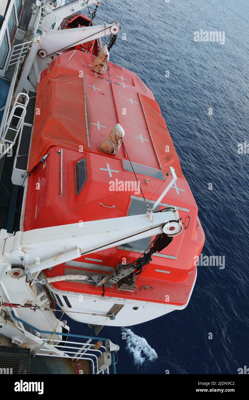 rescue orange boat for emergency at sea, maritime transport theme Stock ...