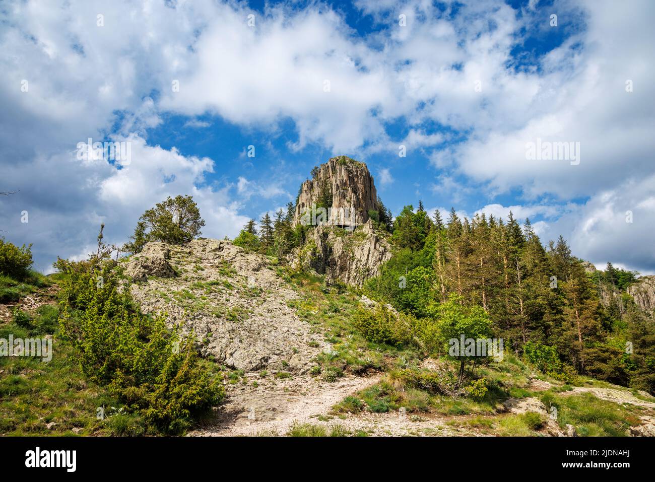 High rocky wild mountain range of Rhodope Mountains covered with green ...