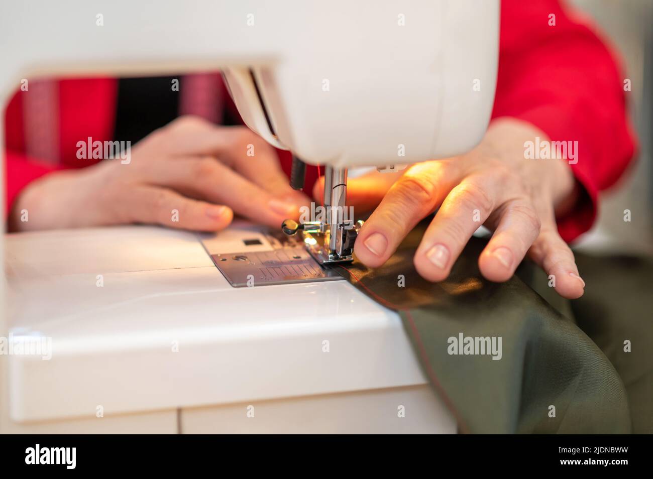 Tailoring person hi-res stock photography and images - Alamy