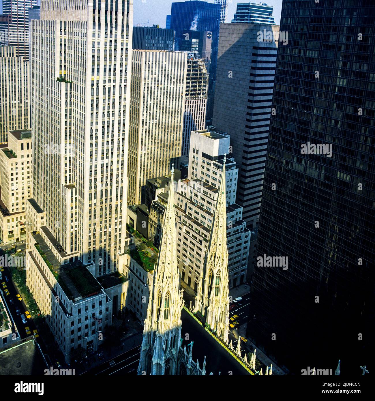 New York 1980s, St Patrick cathedral's spires and midtown skyscrapers ...