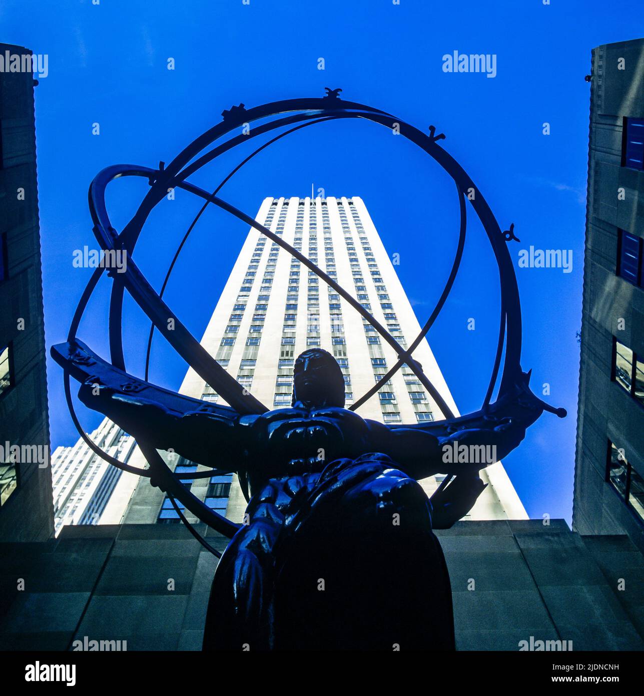 New York 1980s, Atlas bronze statue silhouette in front of Rockefeller ...