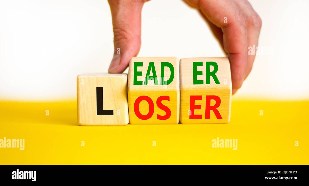 Loser or leader symbol. Concept words Loser or leader on wooden cubes ...