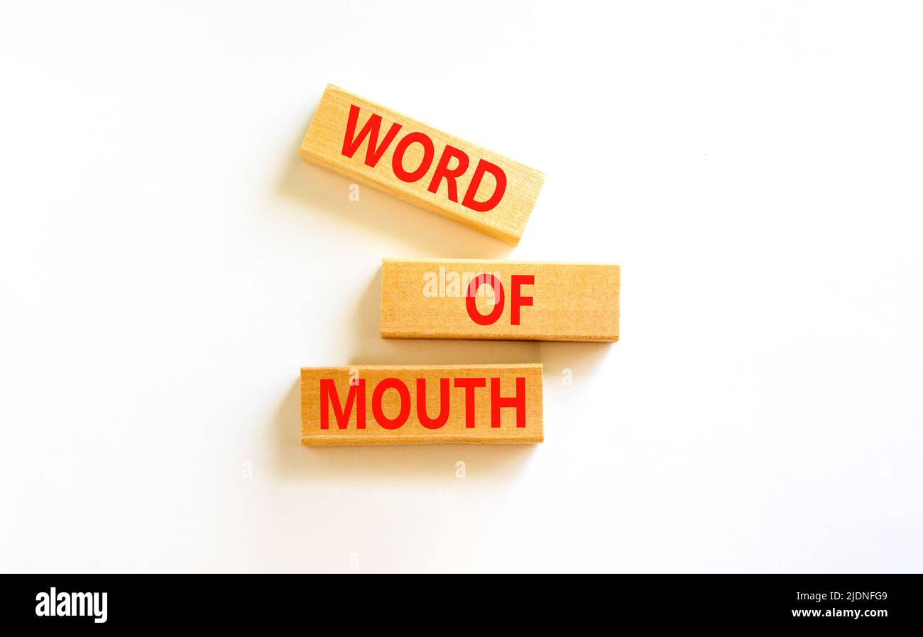 Word of mouth symbol. Concept words Word of mouth on wooden blocks on a ...