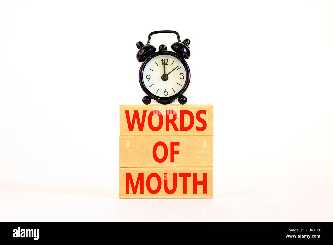 Words of mouth symbol. Concept words Words of mouth on wooden blocks on ...