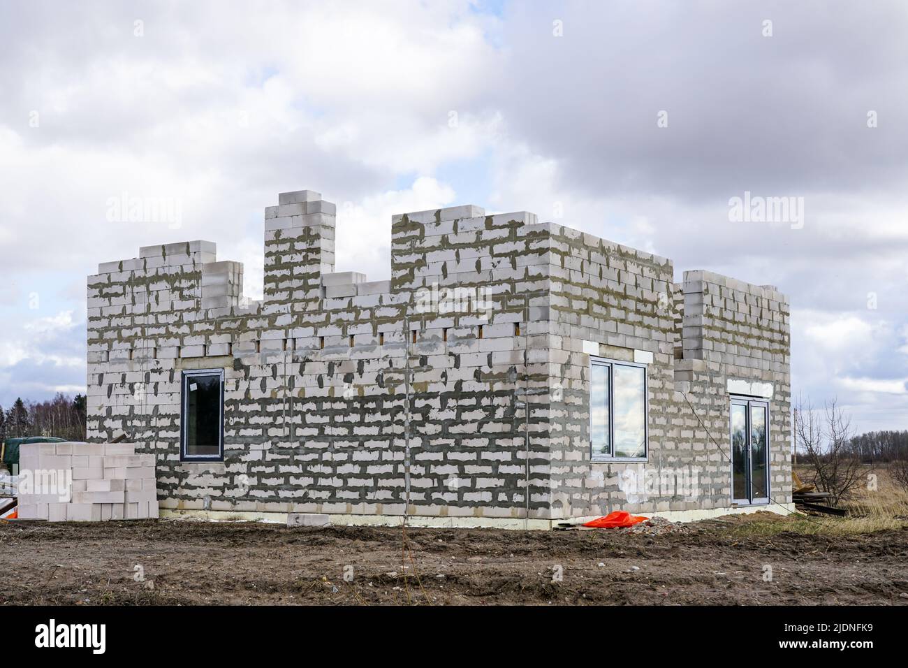 unfinished concrete blocks frame of a new private house under ...