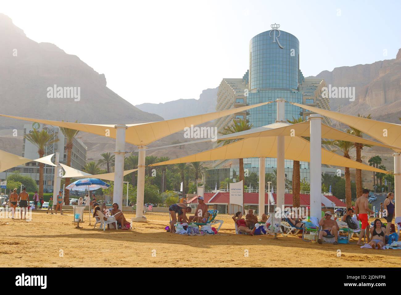 EIN BOKEK, ISRAEL - SEPTEMBER 22, 2017: Vacationers and tourists rest on the Dead Sea resort on ...