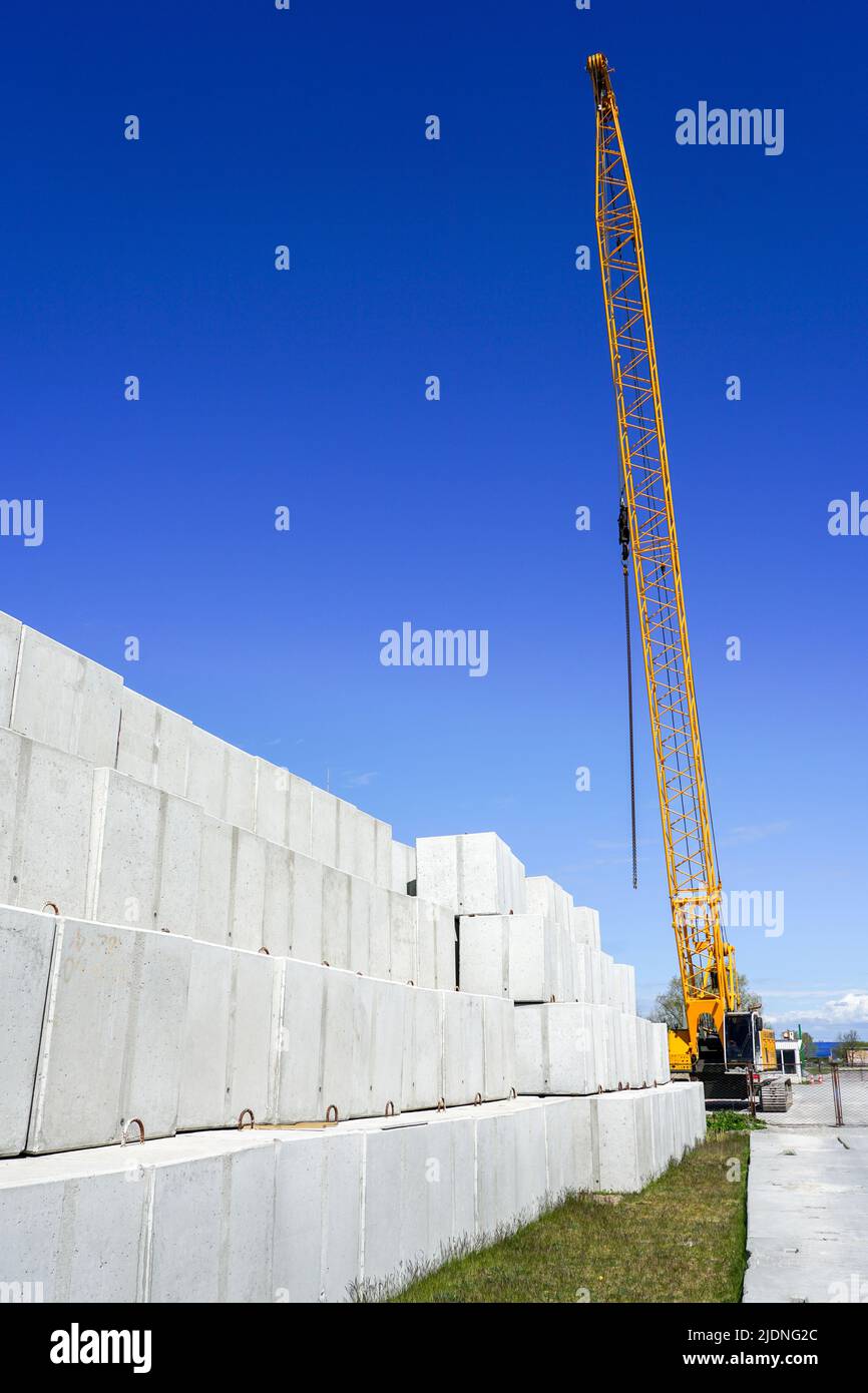 Large concrete cube block stacks in the backyard of a concrete product ...