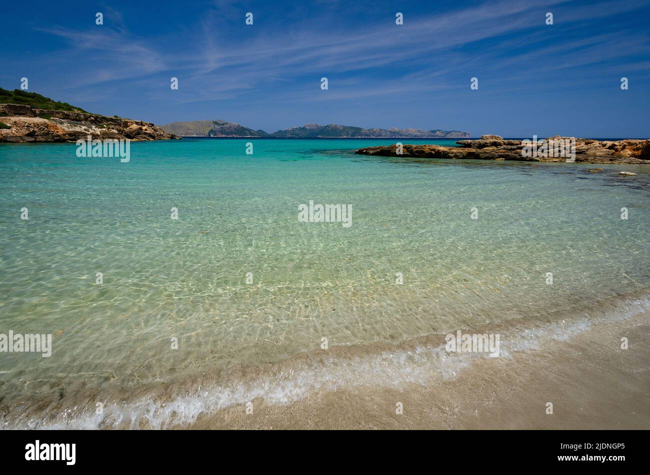 Beach with crystal clear sea water Stock Photo - Alamy