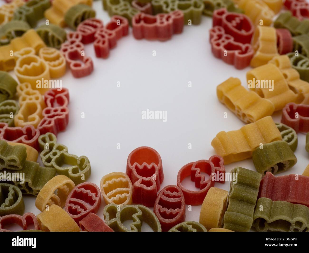 Raw pasta. Vermicelli in different colors. Pasta on a white background ...