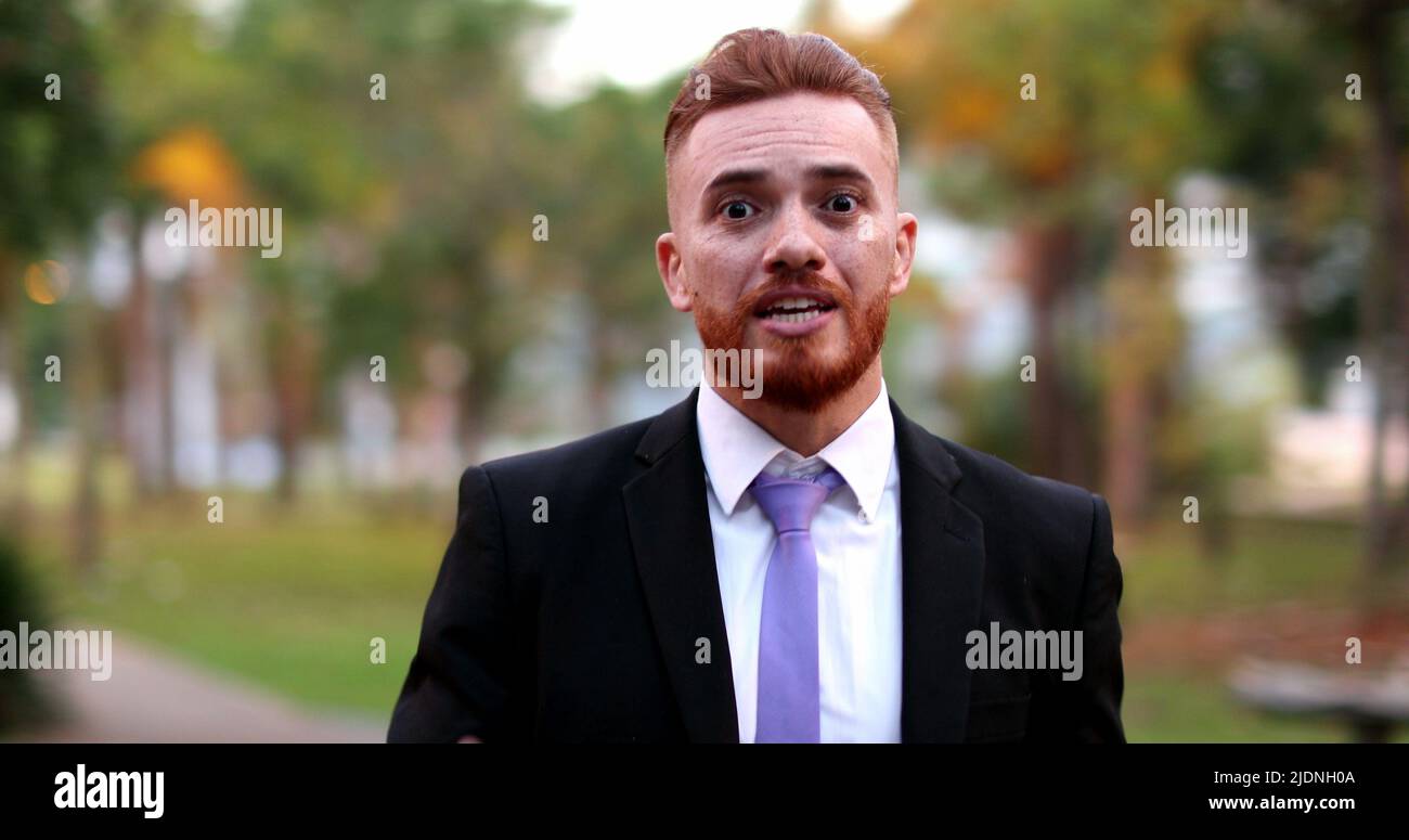 Frustrated businessman standing outside corporate hi-res stock ...