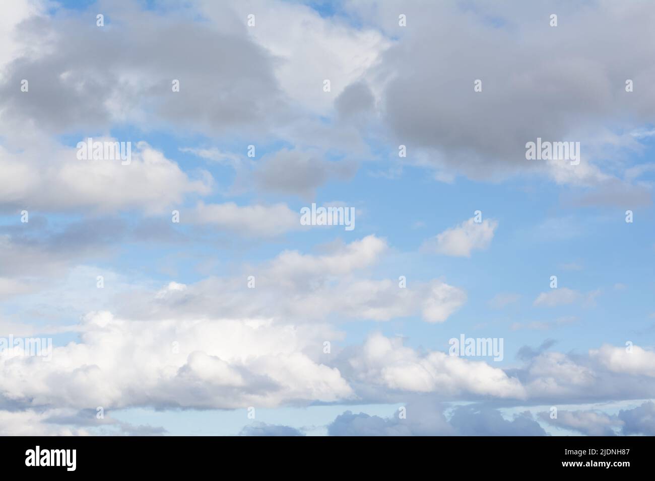 Cloudy blue sky Stock Photo - Alamy