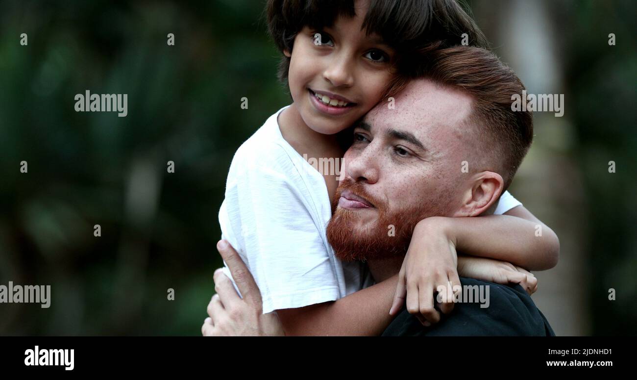 Beautiful tender moment between father and child son outside ...