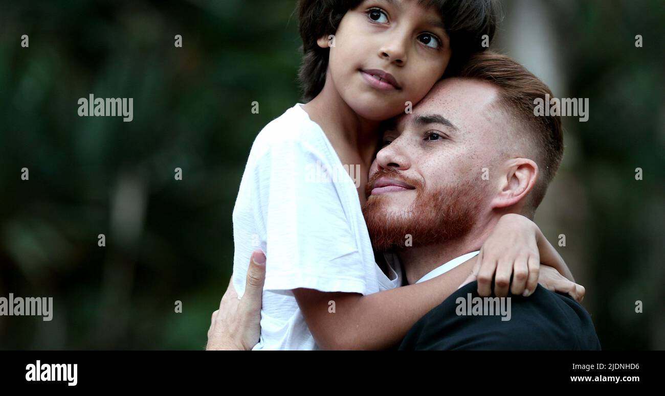 Beautiful tender moment between father and child son outside ...