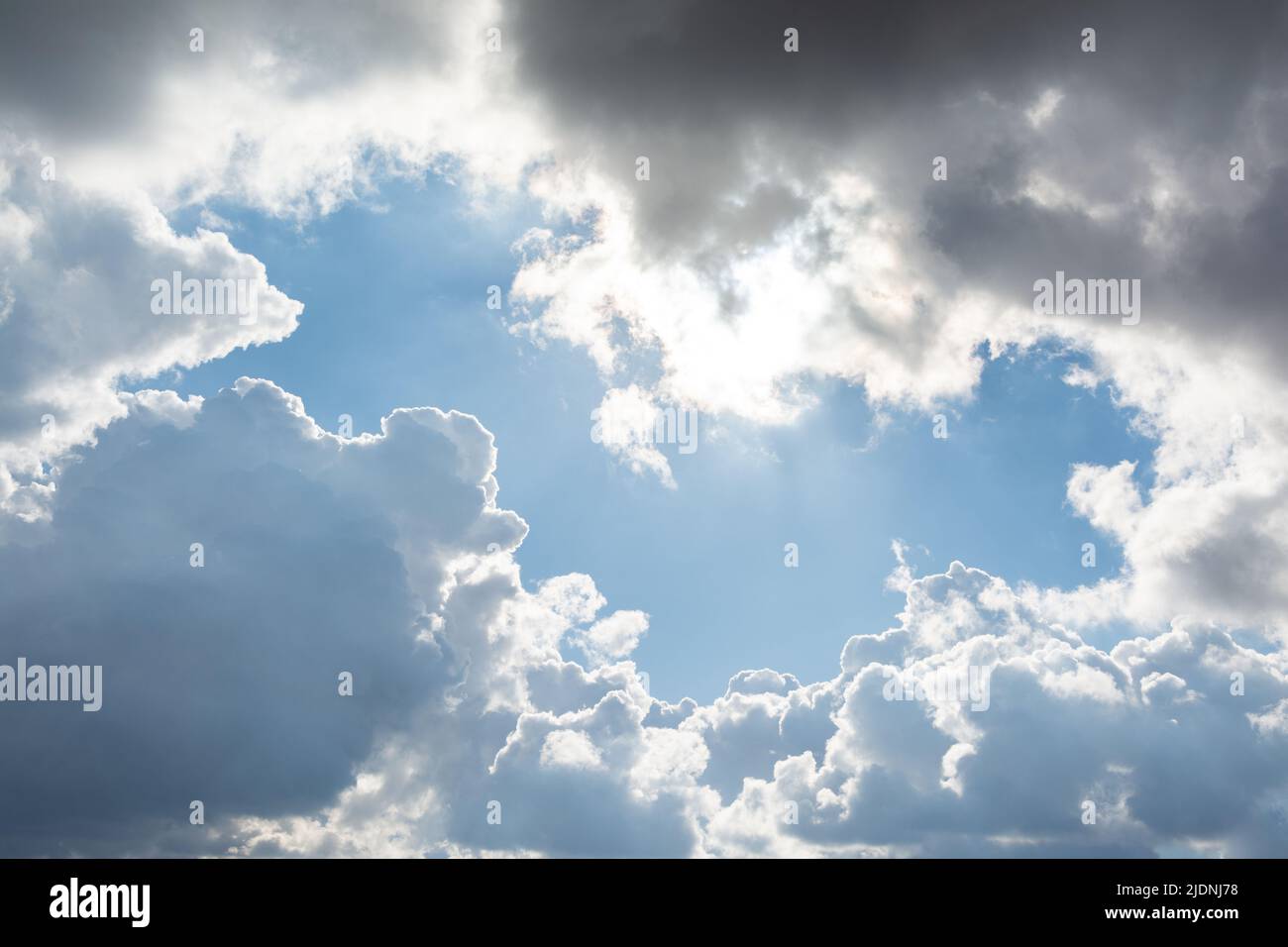 Clear and cloudy sky hi-res stock photography and images - Alamy