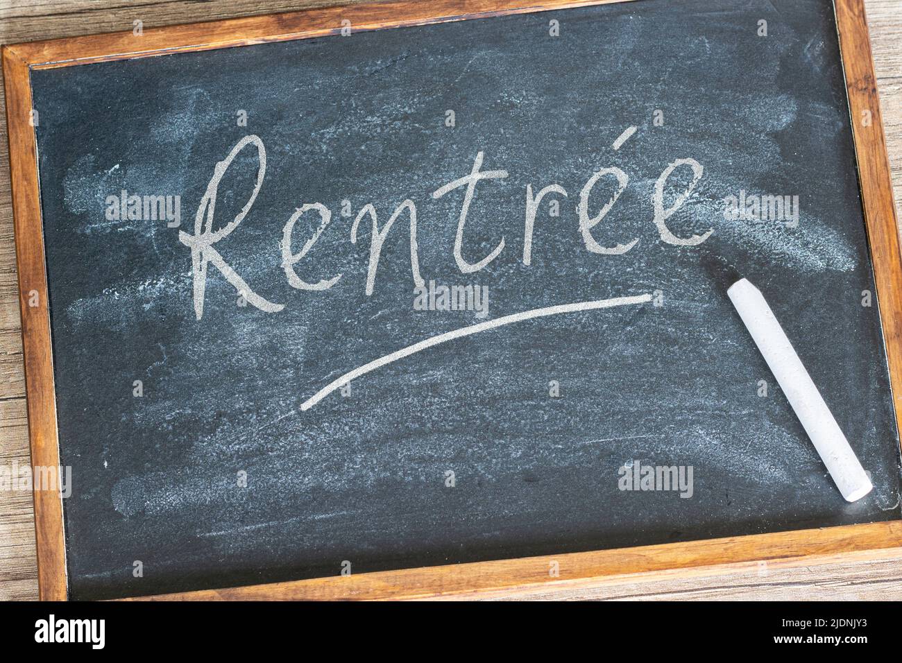 Wooden slate with the inscription "Rentrée", written in French Stock ...