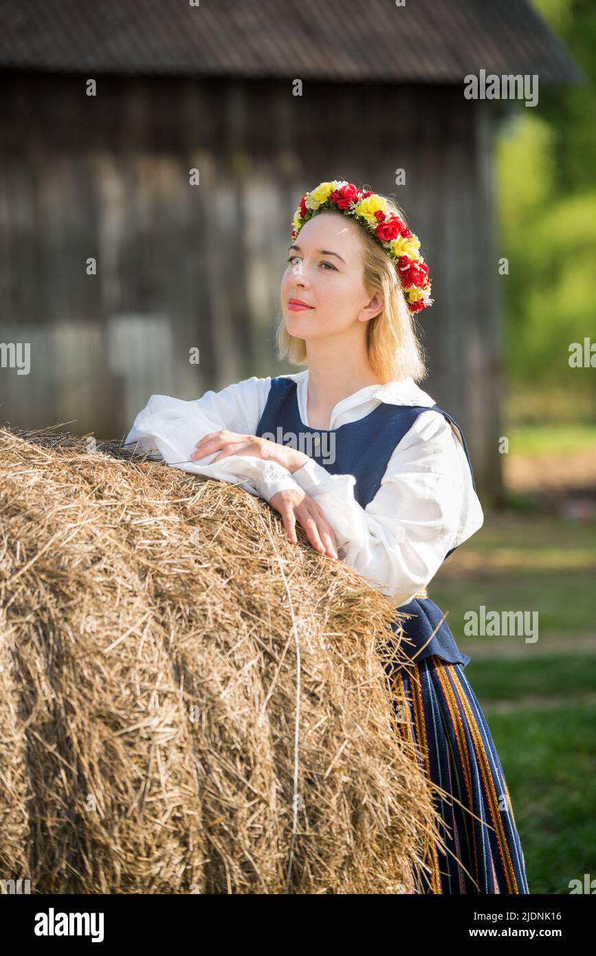 Woman in traditional clothing posing on nature in village Stock Photo ...