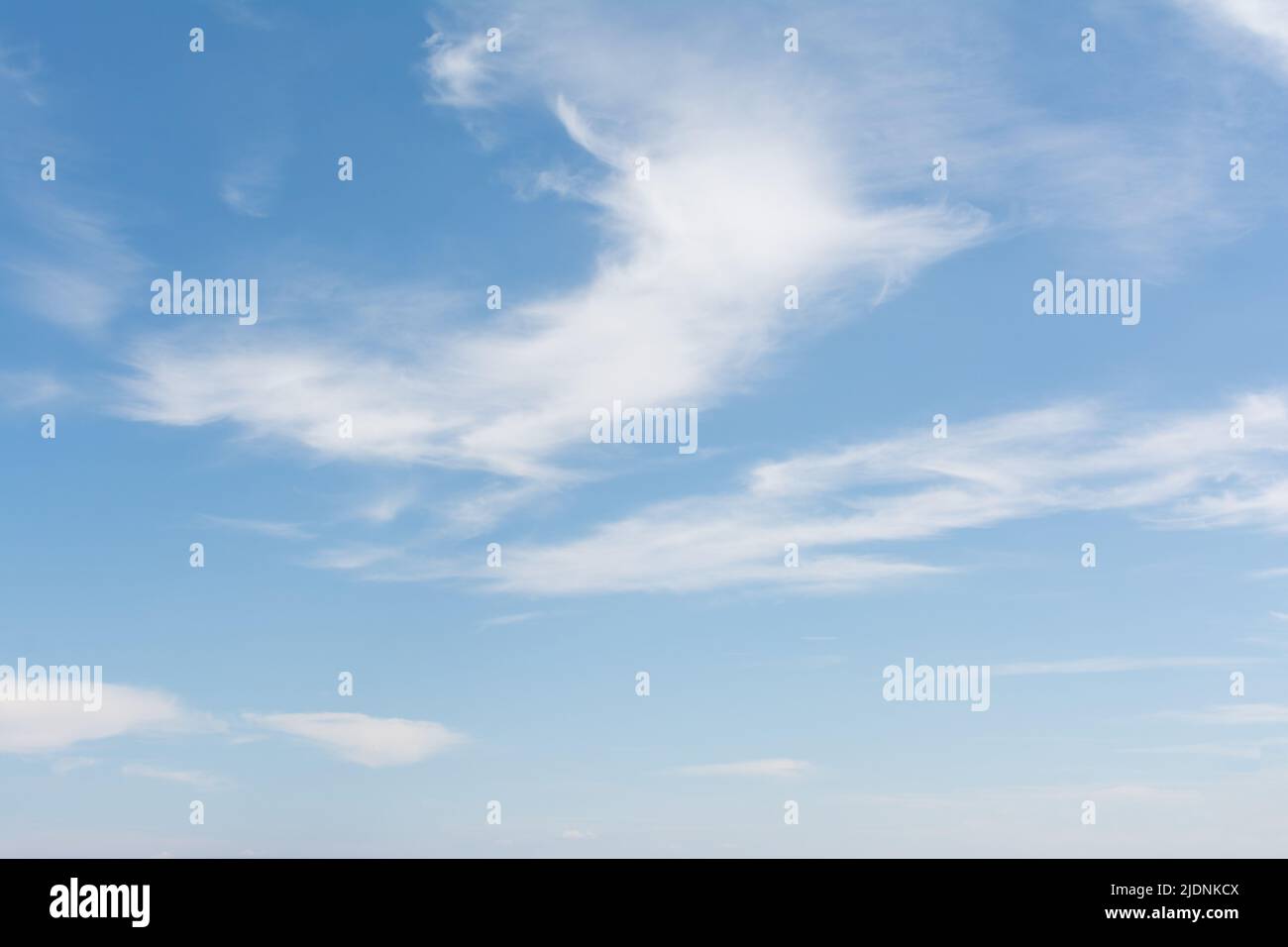 Cloudy blue sky Stock Photo - Alamy