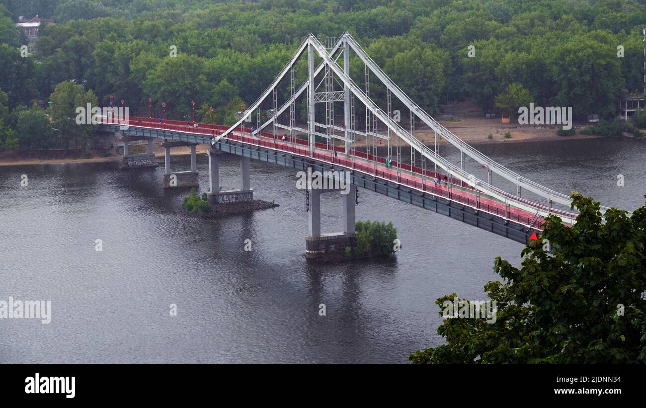 Kiev, Ukraine July 12, 2019: Park pedestrian bridge on Trukhanov Island ...