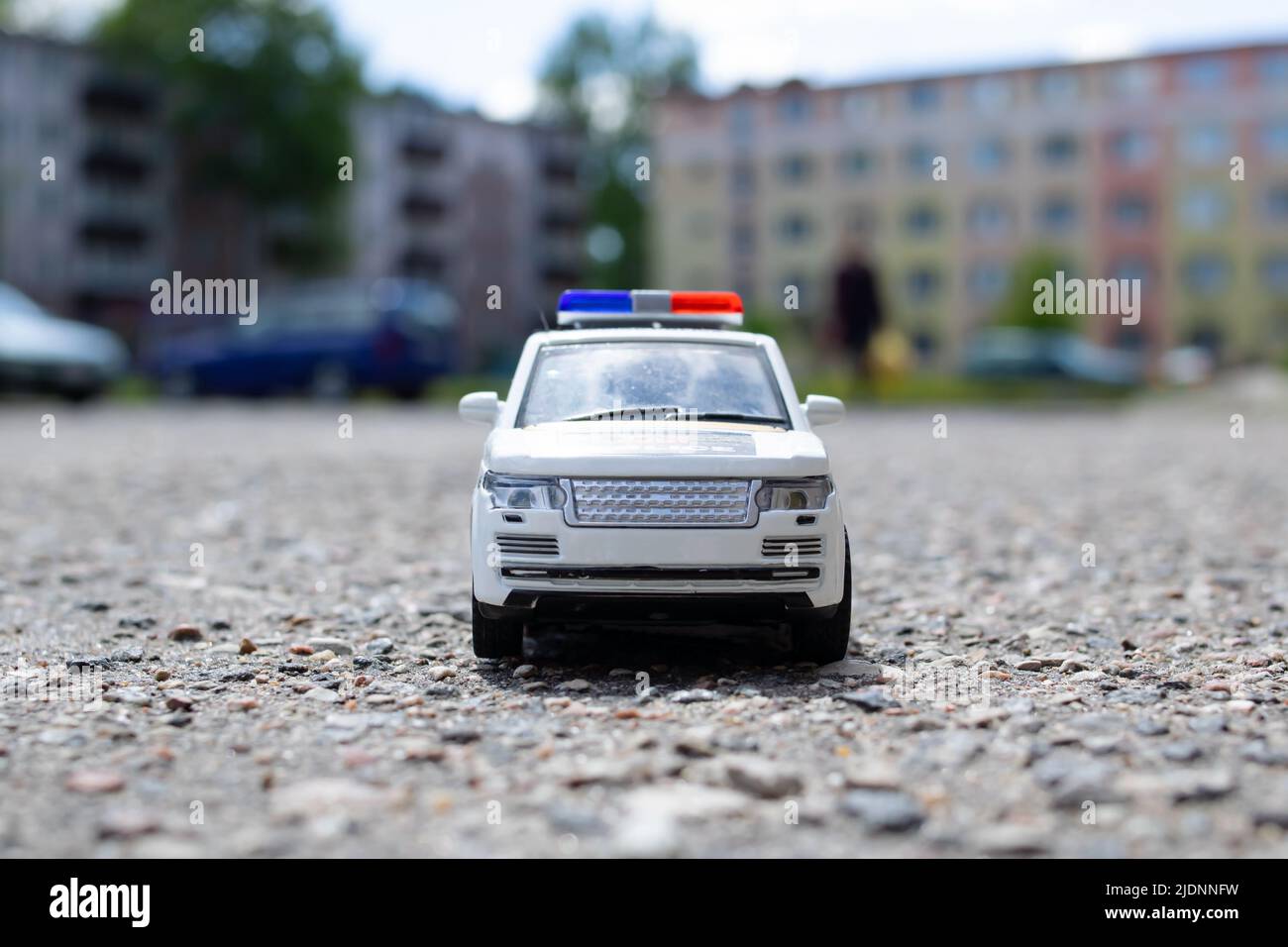 Police toy car on the street closeup Stock Photo - Alamy