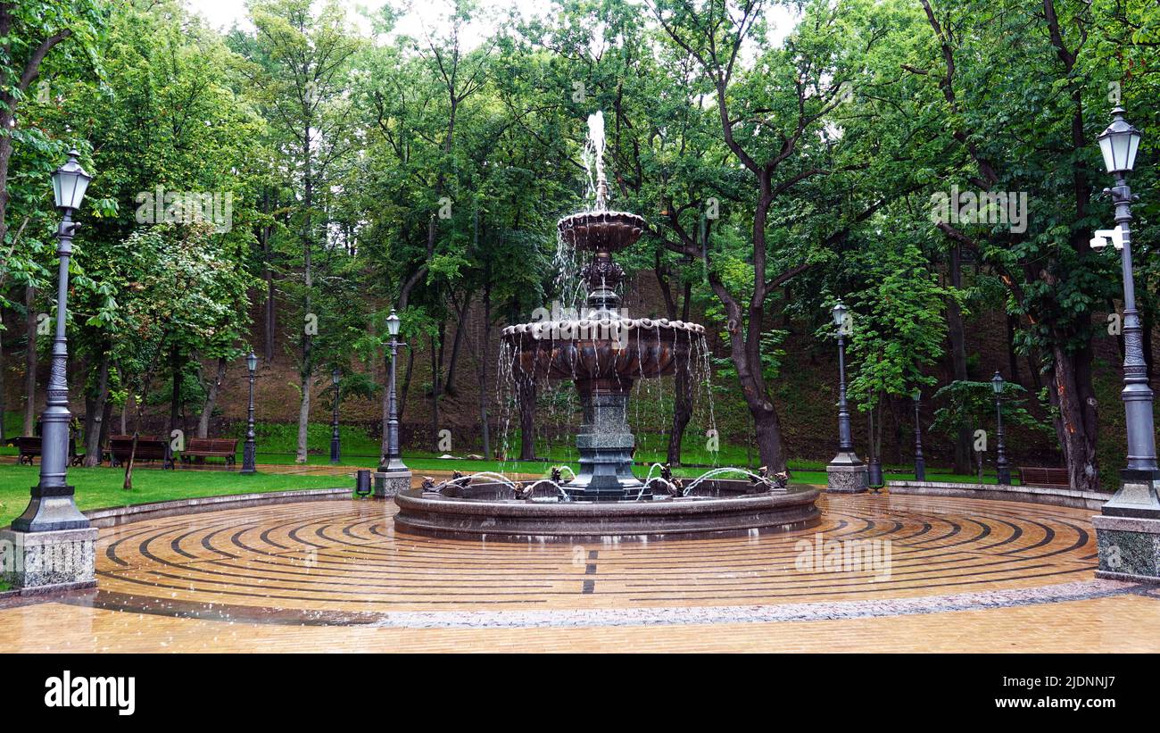 Kiev, Ukraine July 12, 2019: Ancient city fountain with the faces of a ...