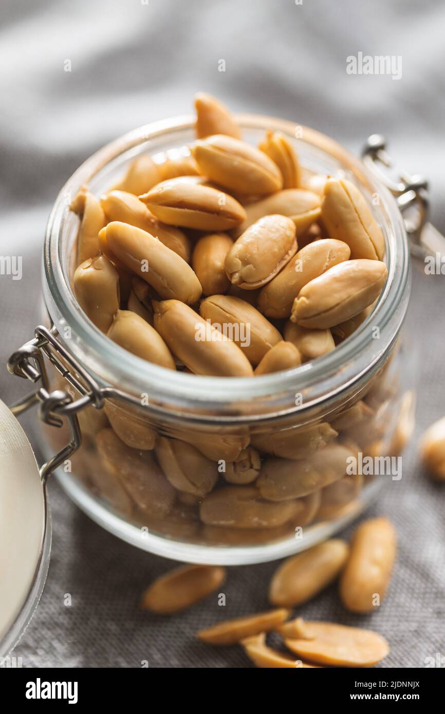 Roasted peeled peanuts in a jar Stock Photo - Alamy