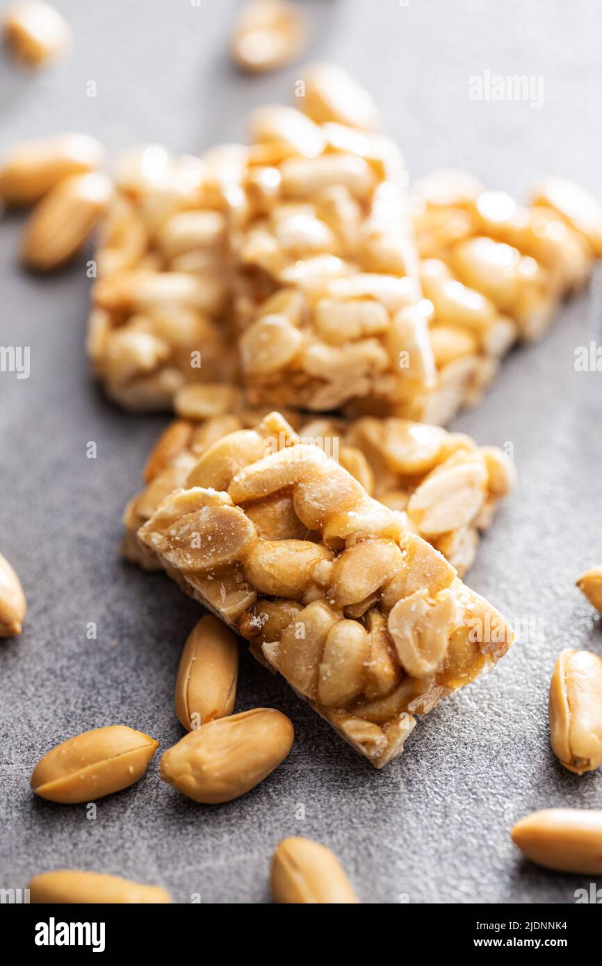 Sweet peanut bars on a kitchen table Stock Photo - Alamy