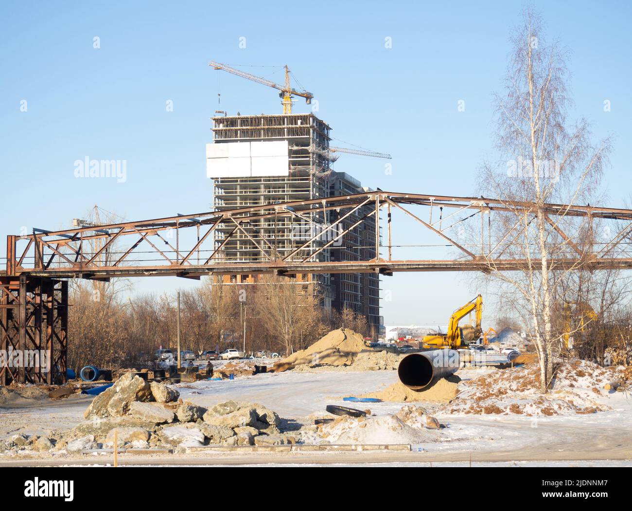 high-rise construction. Urbanization. Cranes are building a skyscraper ...
