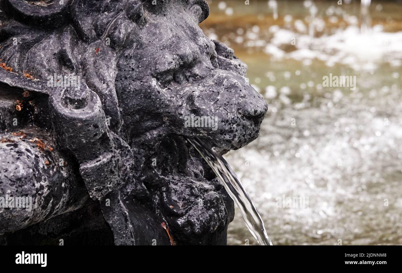 Kiev, Ukraine July 12, 2019: Ancient city fountain with the faces of a ...