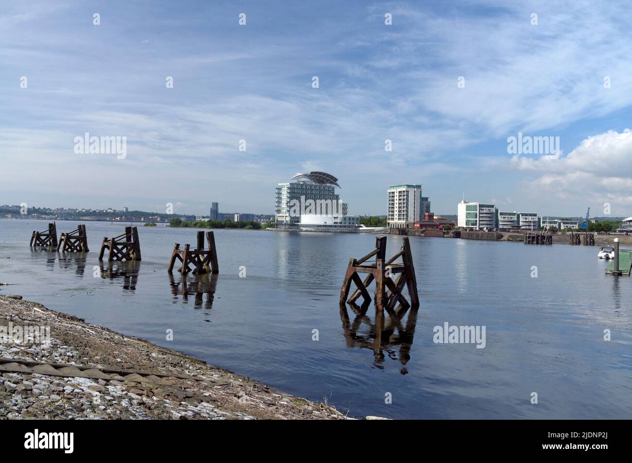View of St David's Hotel (Voco) across Cardiff Bay with old wooden ...