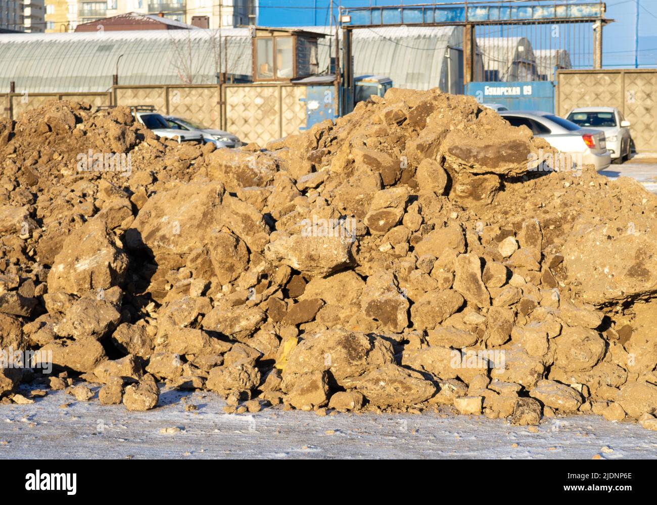 Blocks of frozen earth. A pile of earth. Cold weather. The consequences ...